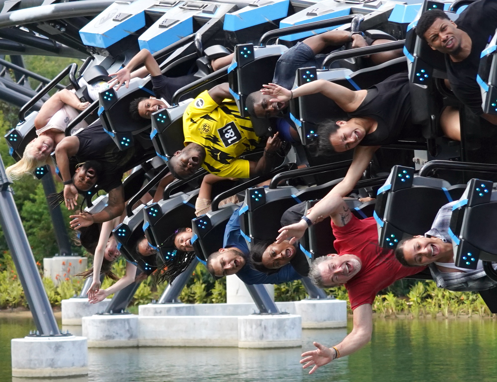 Happy, funny, fearful faces on Jurassic World VelociCoaster