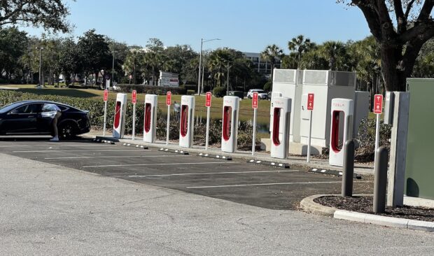 Where can I charge my electric vehicle at Walt Disney World?