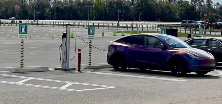 Where can I charge my electric vehicle at Walt Disney World?