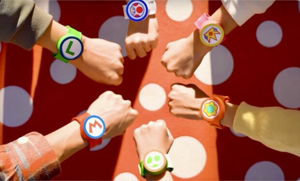 How do Power-Up Bands work in Super Nintendo World?