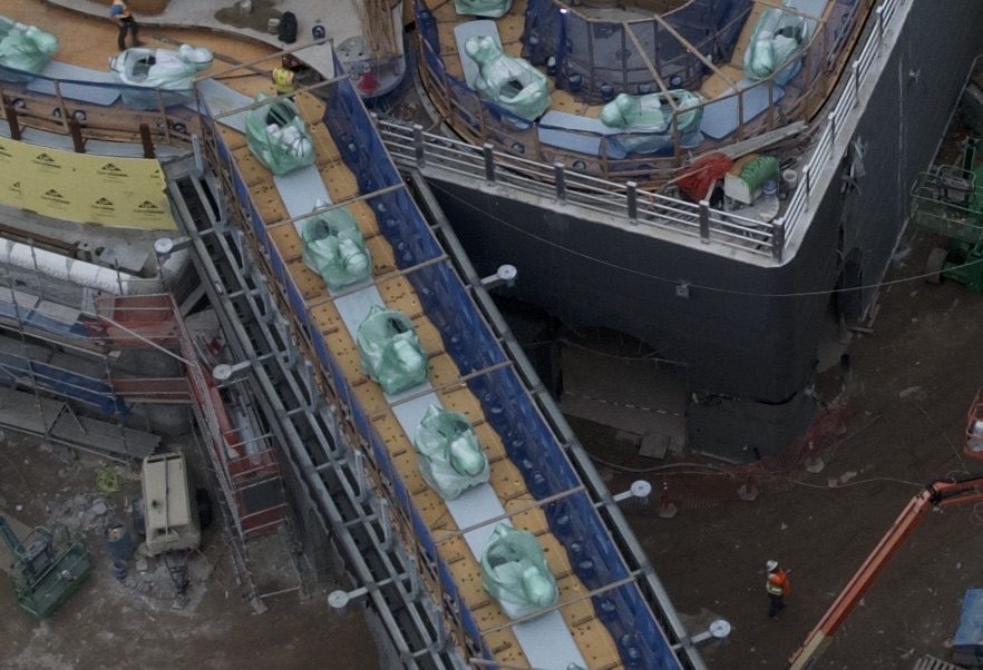 Yoshi waits patiently for riders at Epic Universe in drone photos