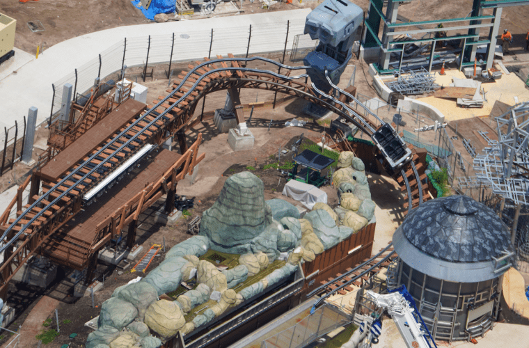 Epic Universe coasters testing, sculptures installed