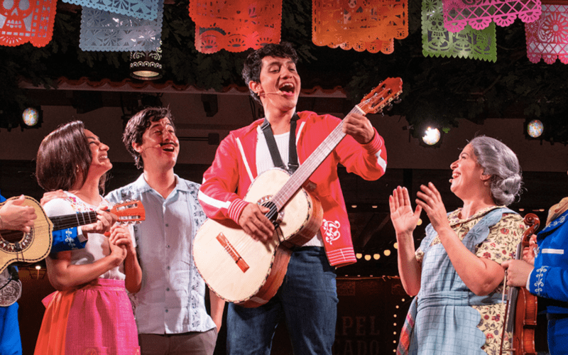 Coco characters Miguel and family at Disney Treasure restaurant