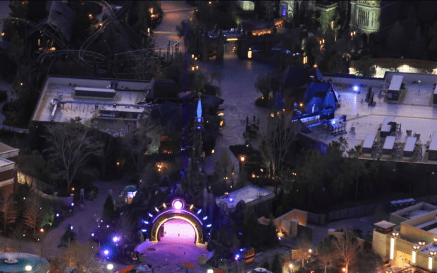 Epic Universe night time fly-through above Nintendo, Harry Potter